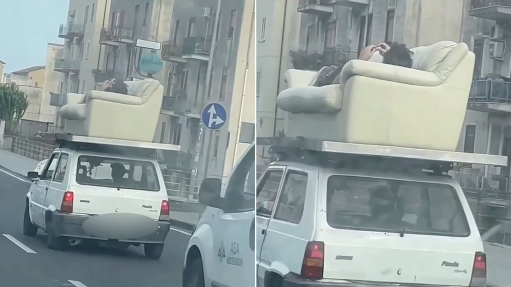 Sdraiato sul divano sul tetto dell'auto per le vie della città: il ...